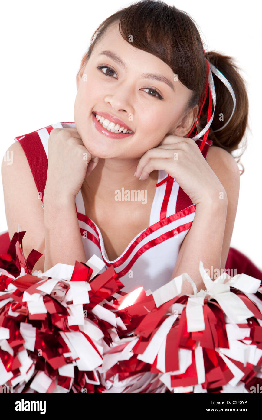 Portrait of a cheerleader in red Stock Photo - Alamy