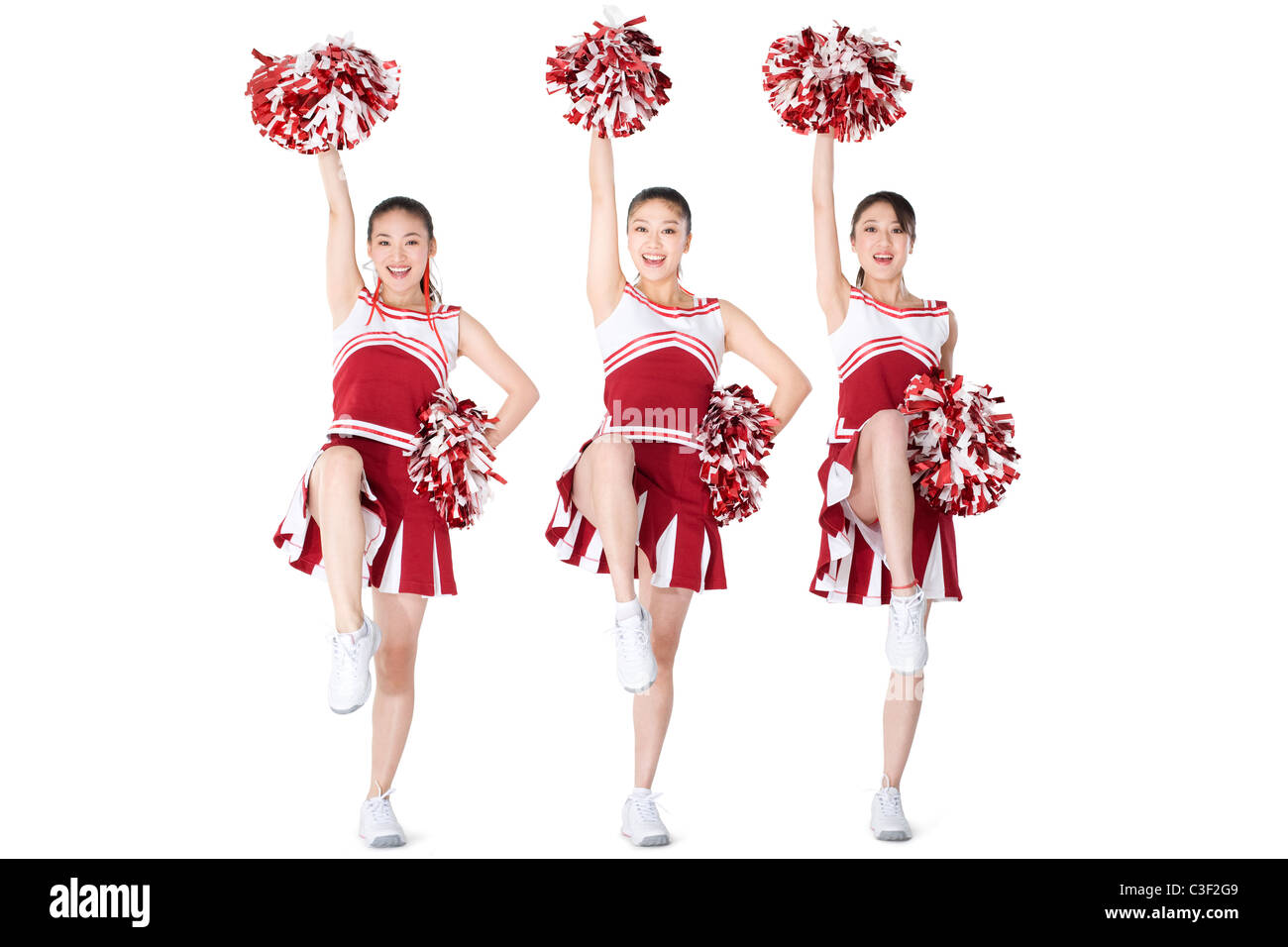 Cheerleaders performing a routine Stock Photo - Alamy