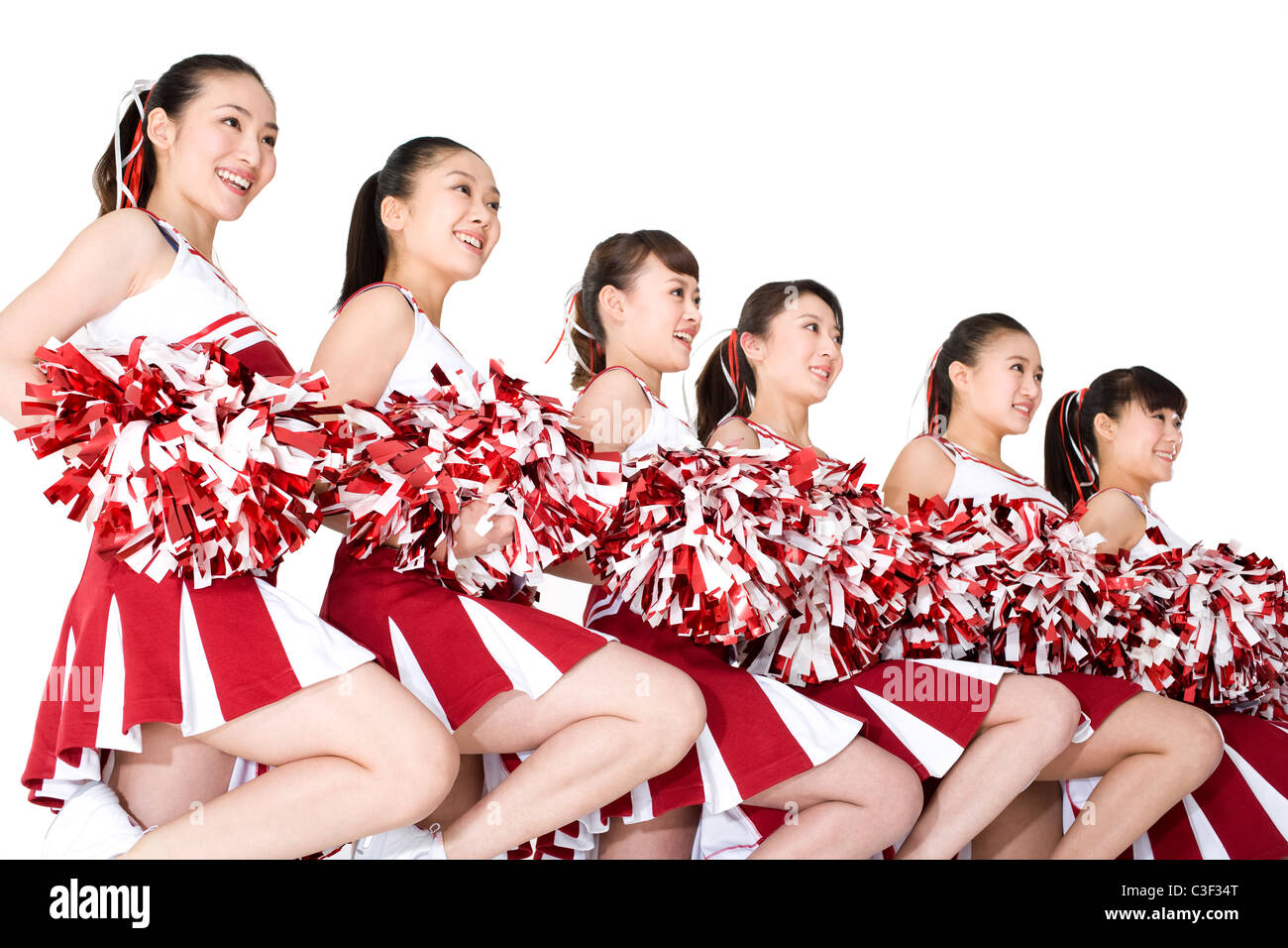 Cheerleaders performing a routine Stock Photo - Alamy