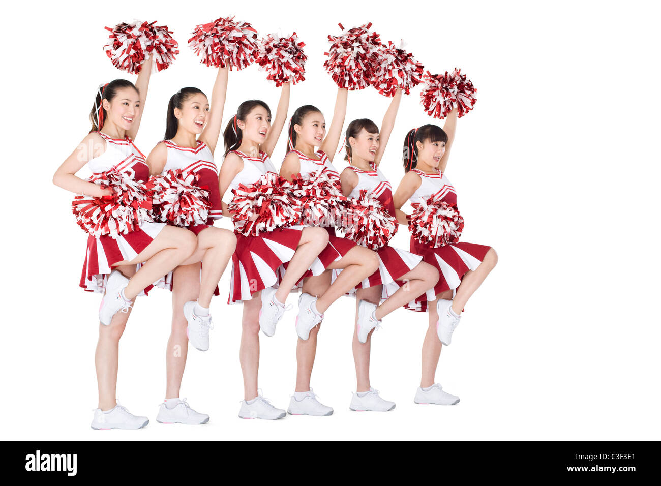 Cheerleaders performing a routine Stock Photo - Alamy