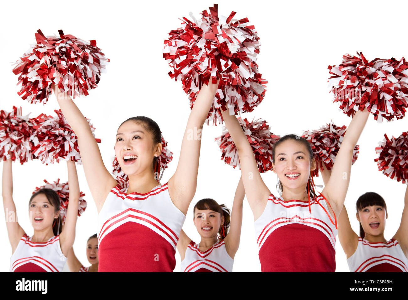 Cheerleaders performing a routine Stock Photo - Alamy