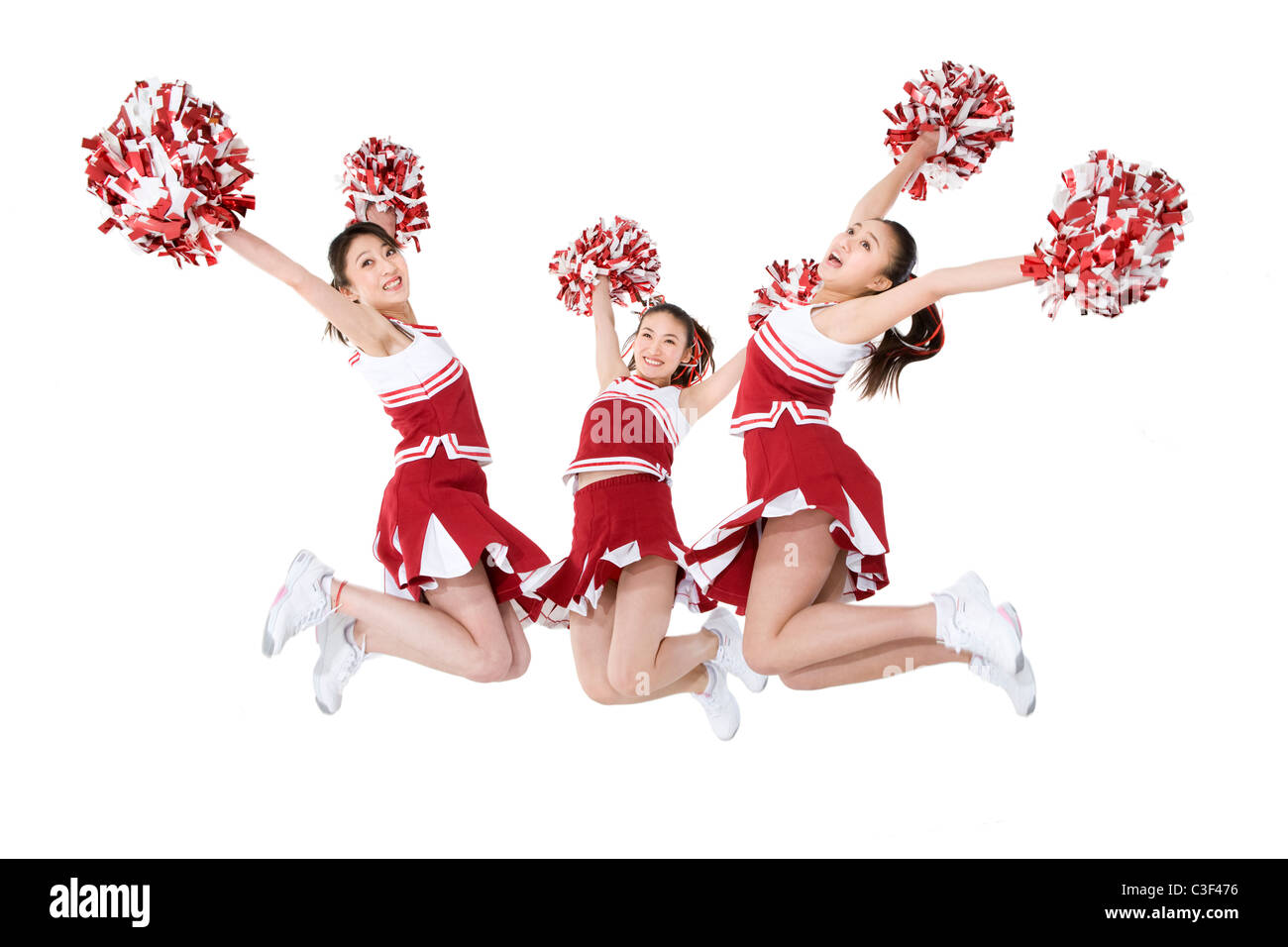 Cheerleaders in action Stock Photo - Alamy