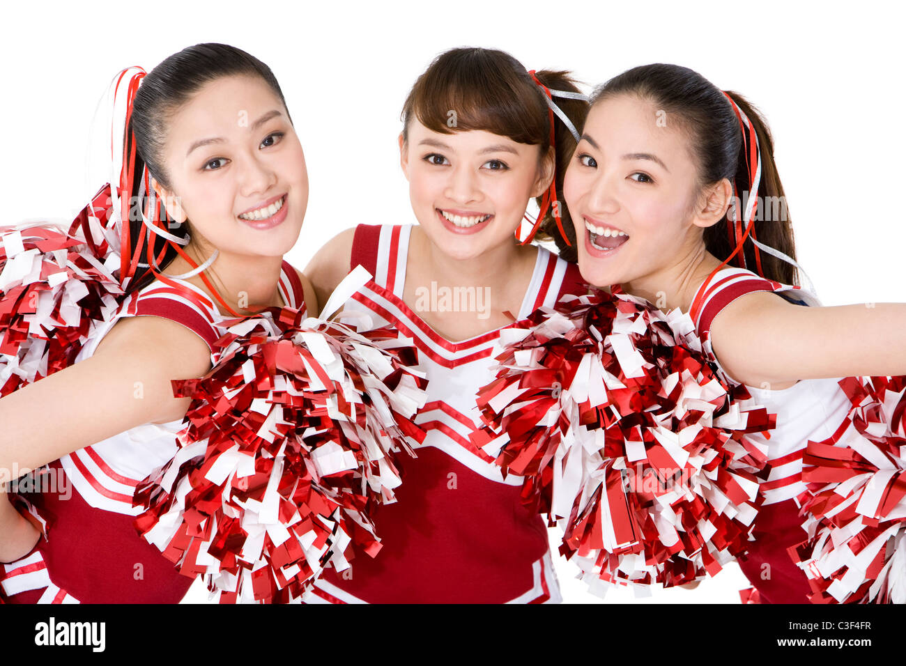 Portrait three cheerleaders hi-res stock photography and images - Alamy