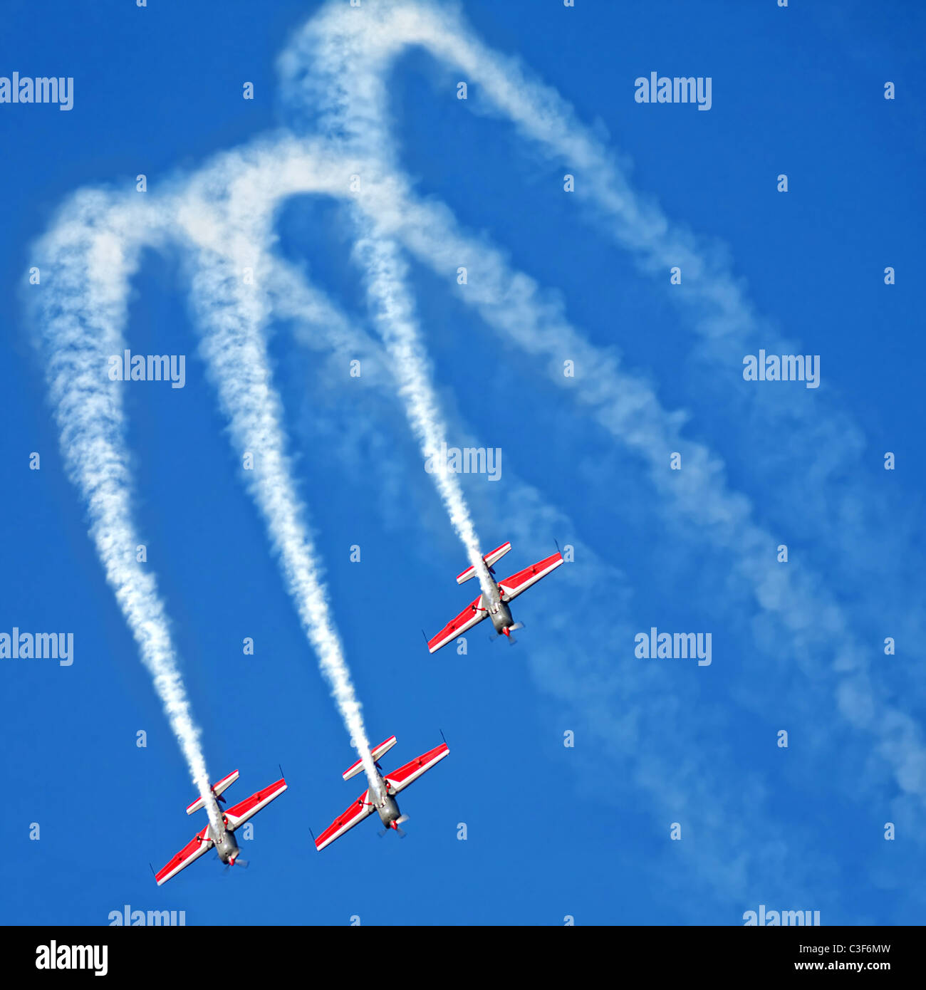 three airplanes in formation on airshow Stock Photo - Alamy