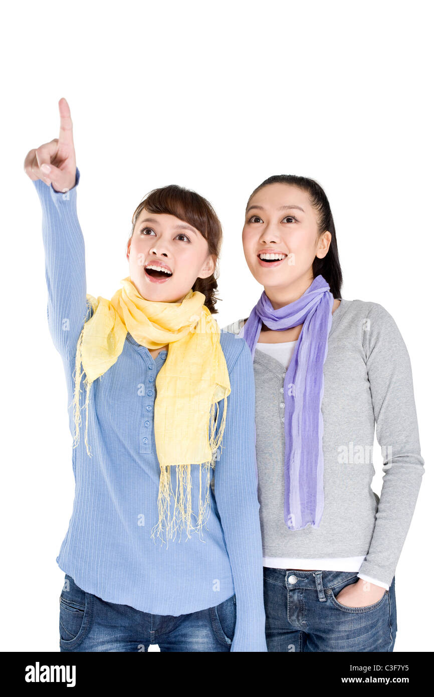 Two women discovering something new Stock Photo - Alamy