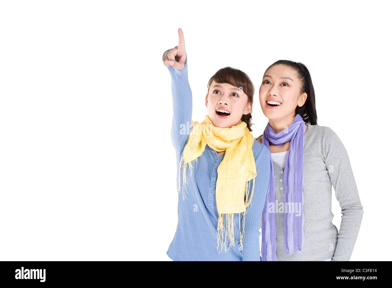 Two women discovering something new Stock Photo - Alamy