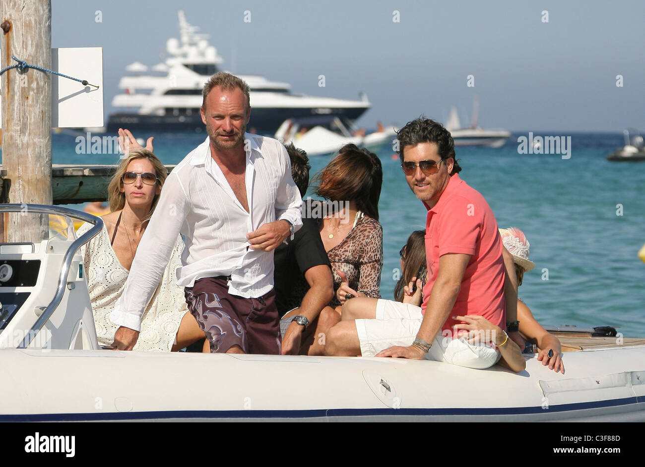 Sting, aka Gordon Sumner, leaving Le Club 55 by boat with his wife ...
