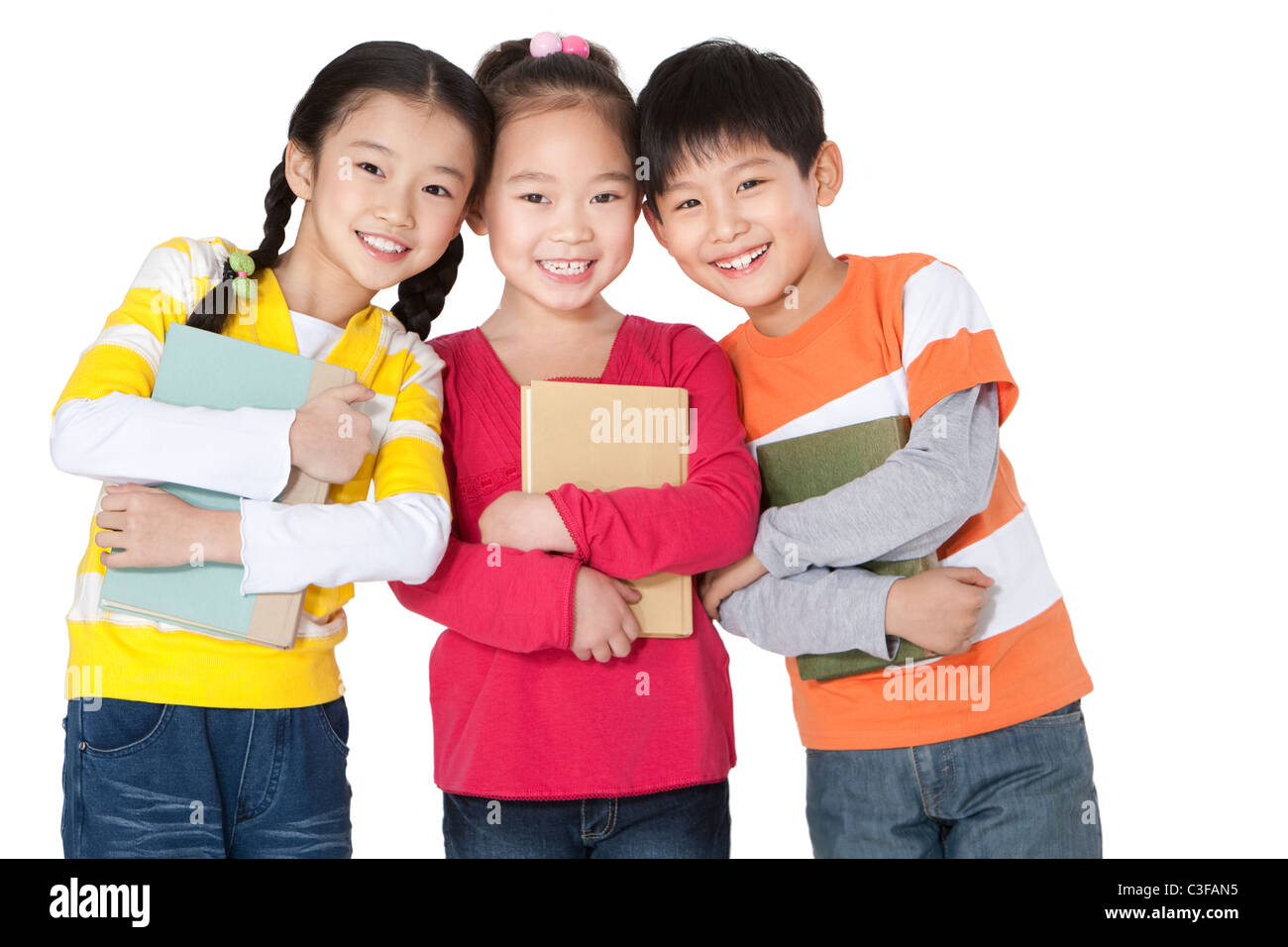 Happy students with books Stock Photo - Alamy