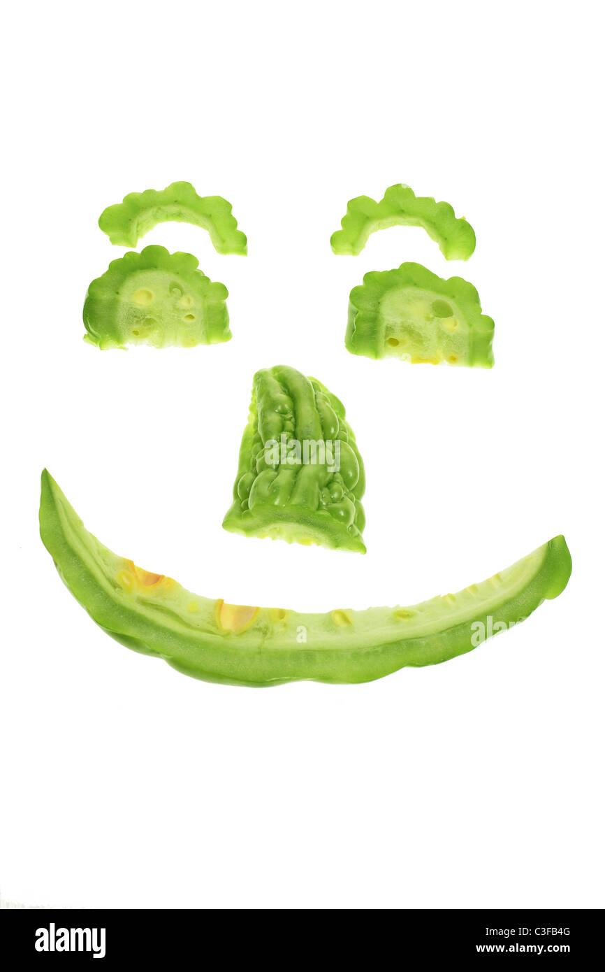 Bitter Gourd Arranged in Shape of Face Stock Photo - Alamy