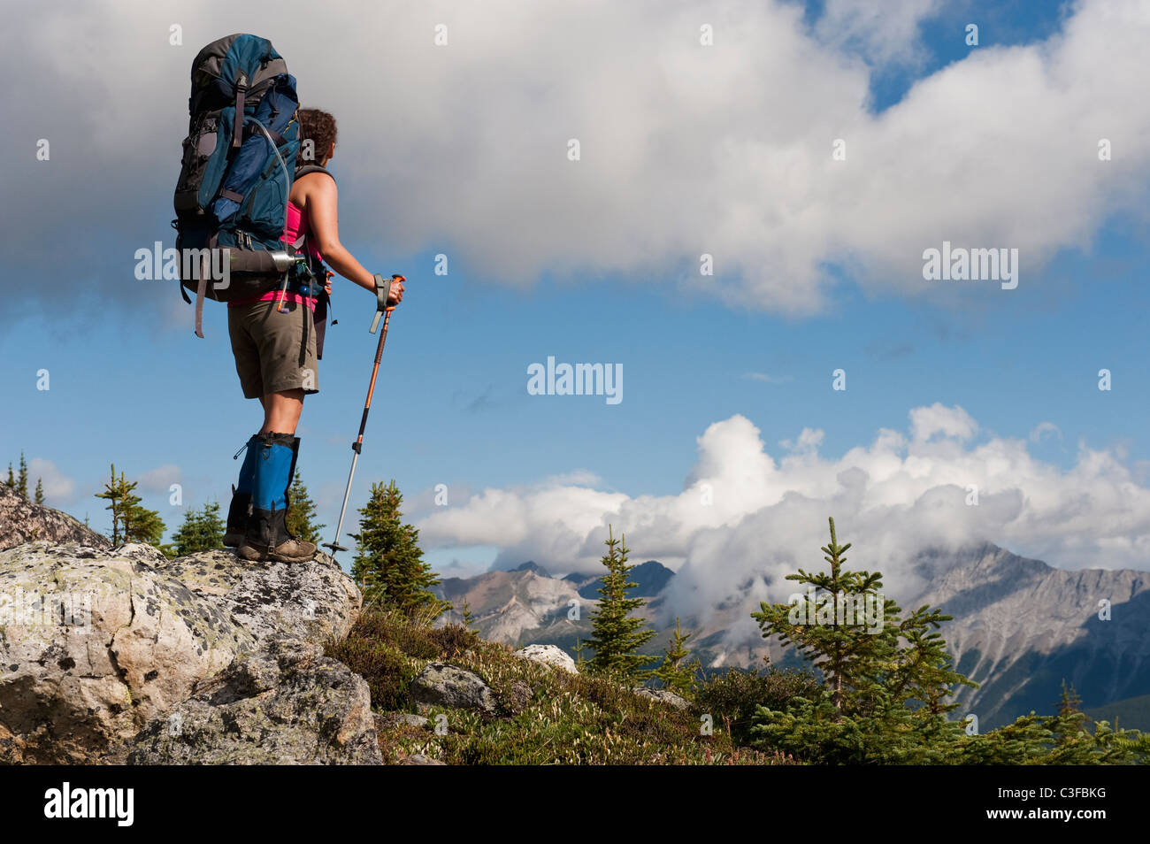 Happy thinking hiking woman hi-res stock photography and images - Alamy