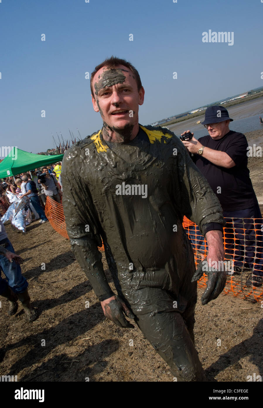 Funny Man Shaun Lock Finishes the Maldon Mud Race Stock Photo - Alamy
