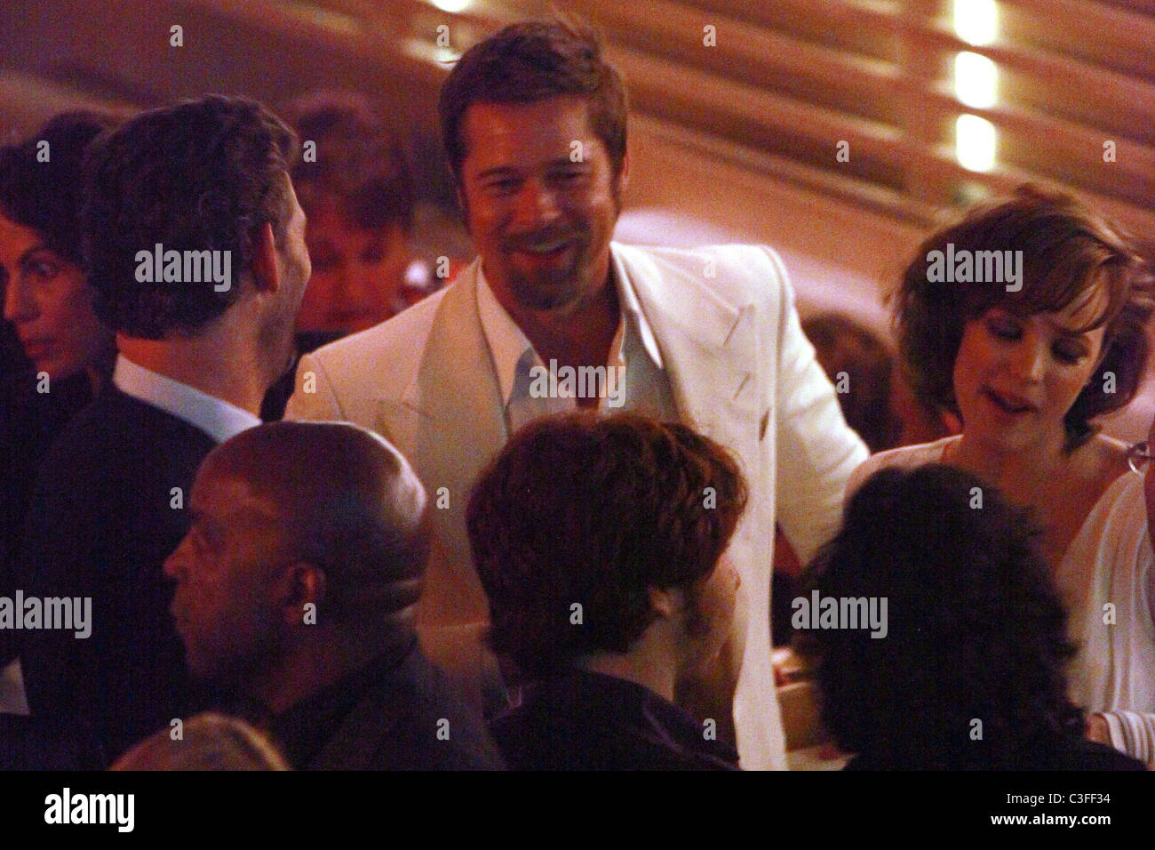 Brad Pitt deep in animated conversation with Eric Bana and Rachel ... Brad Pitt deep in animated conversation with Eric Bana and Rachel ...