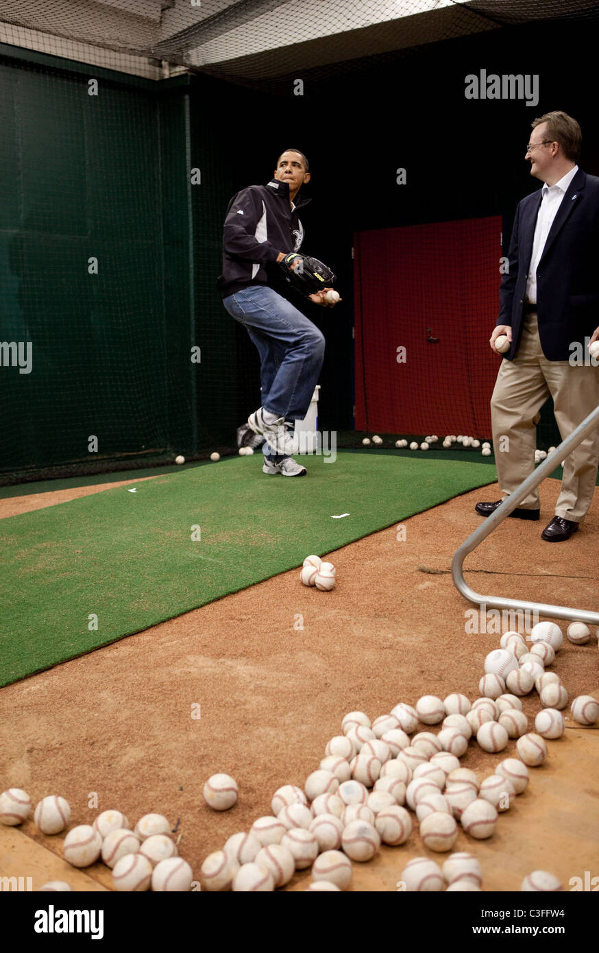 President Barack Obama practices throwing out the first pitch with St ...