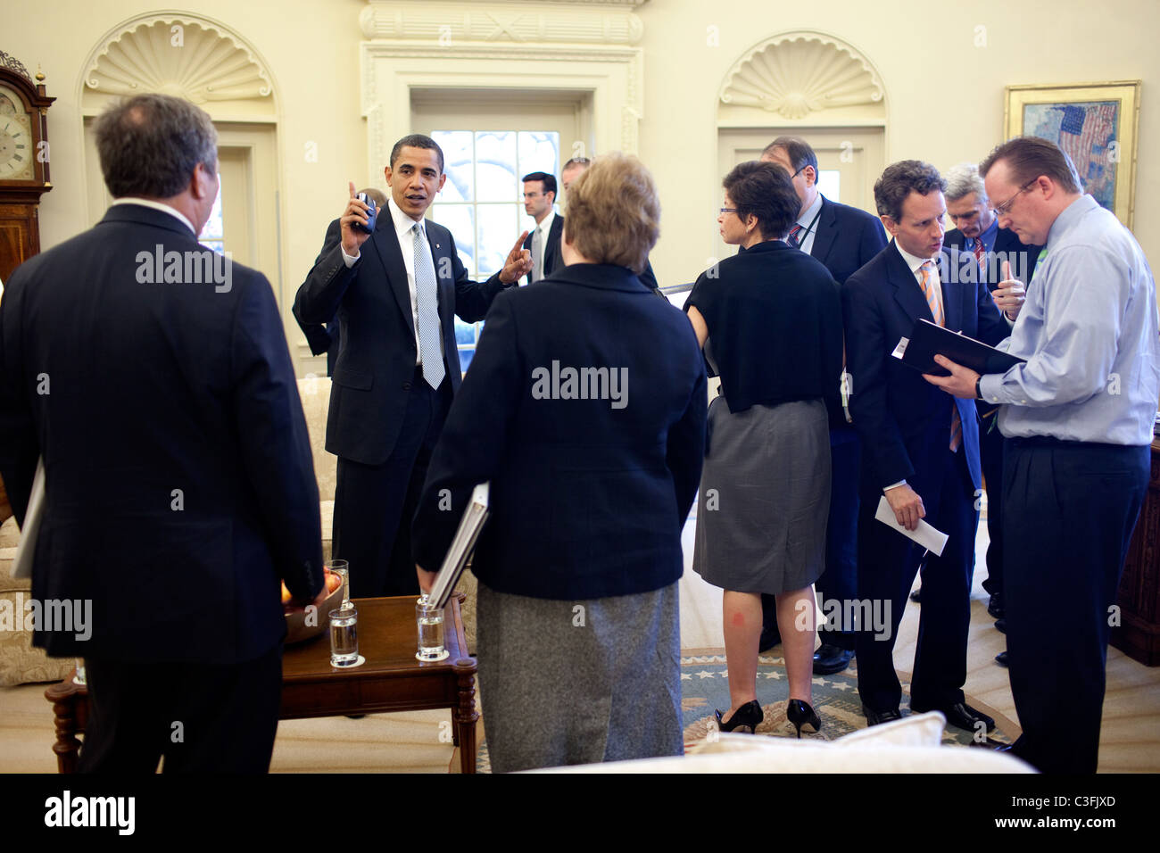 President Barack Obama at a briefing with advisors in the Oval Office ...