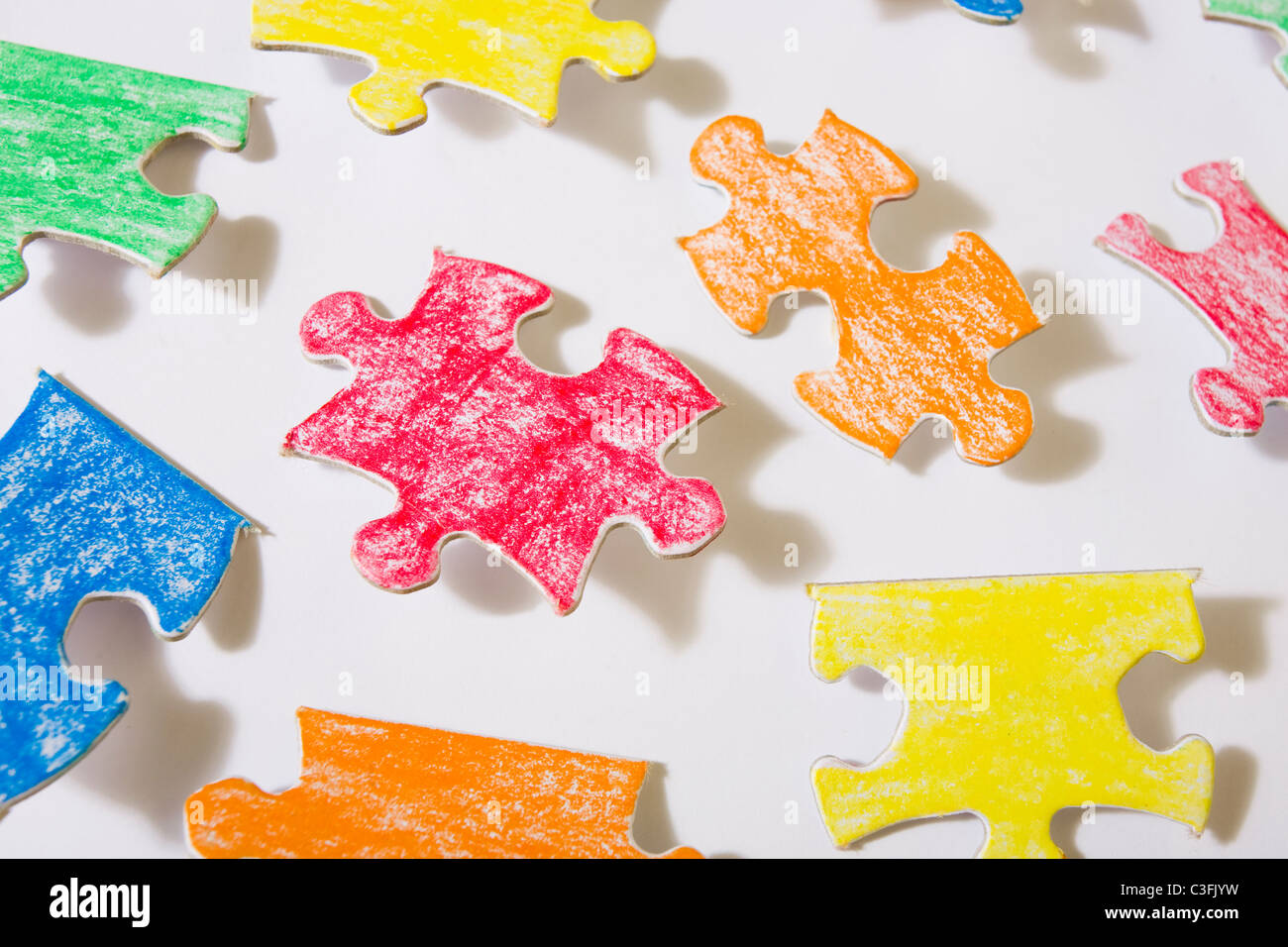 Colorful jigsaw pieces in a range of colors Stock Photo - Alamy