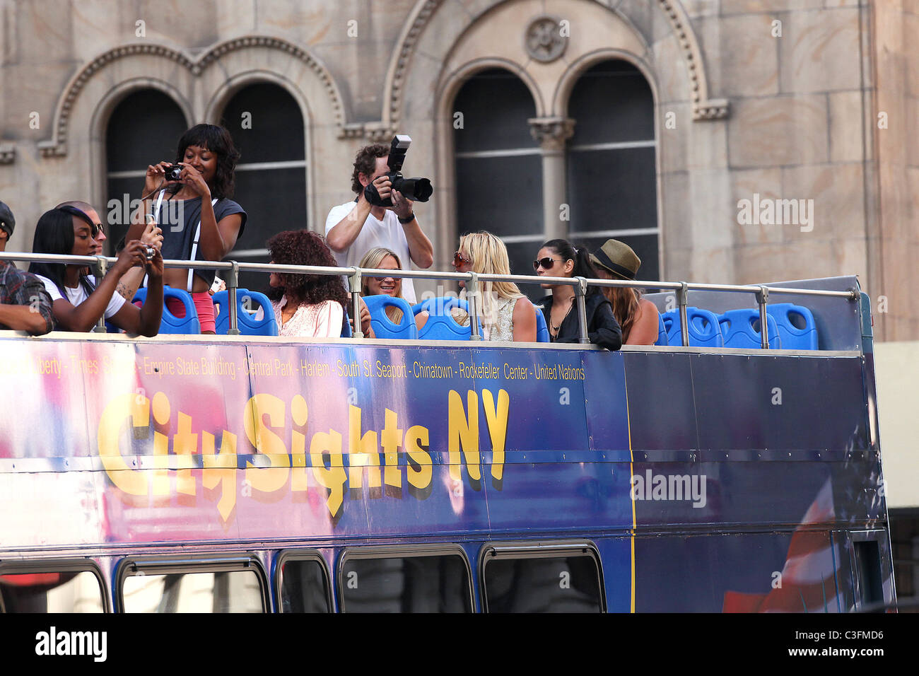 Britney Spears riding a CitySights NY tour bus with her dancers around ...