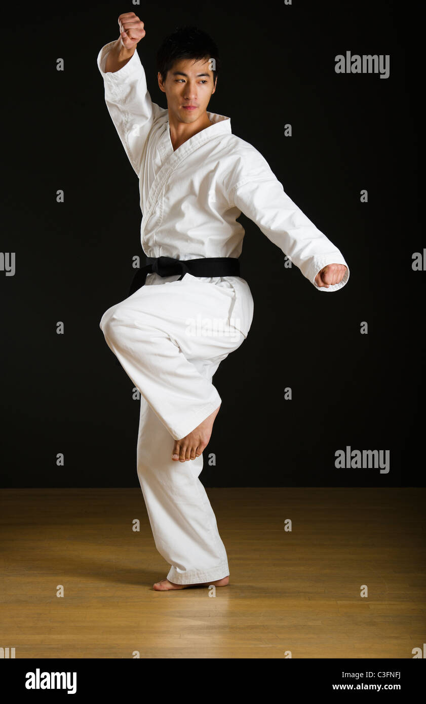 Vertical side shot male asian hi-res stock photography and images - Alamy