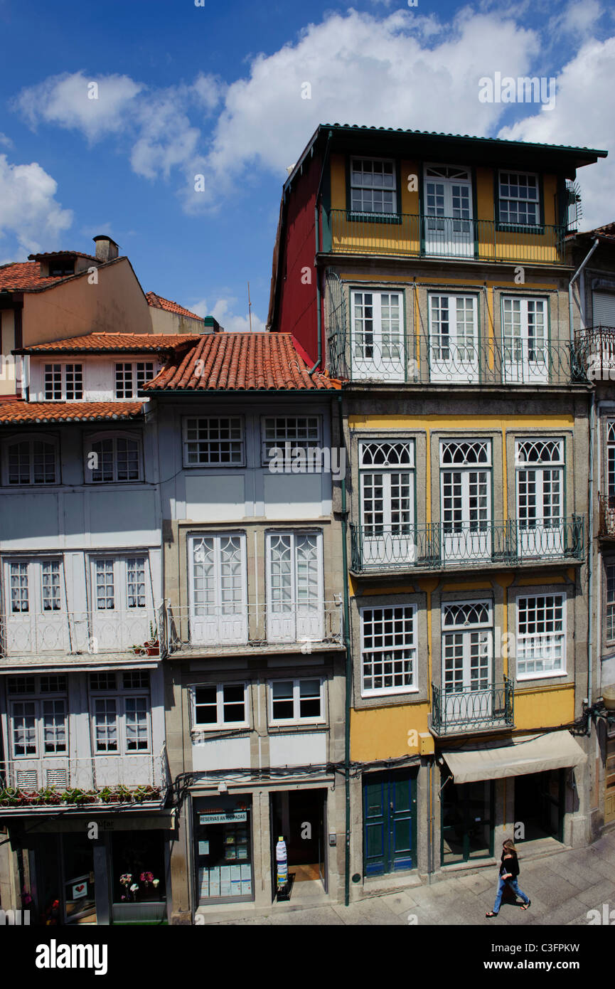 Street scene with traditional buildings in Guimaraes, Portugal Stock ...
