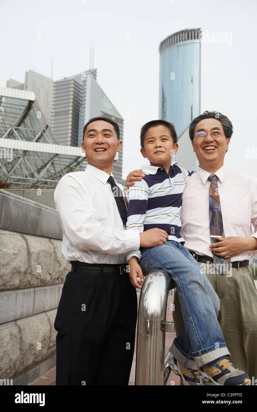 Chinese grandfather, father and son together outdoors Stock Photo - Alamy