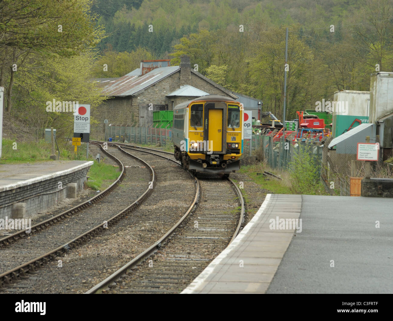 Train arriving from Shrewsbury at Knighton station on the heart of ...