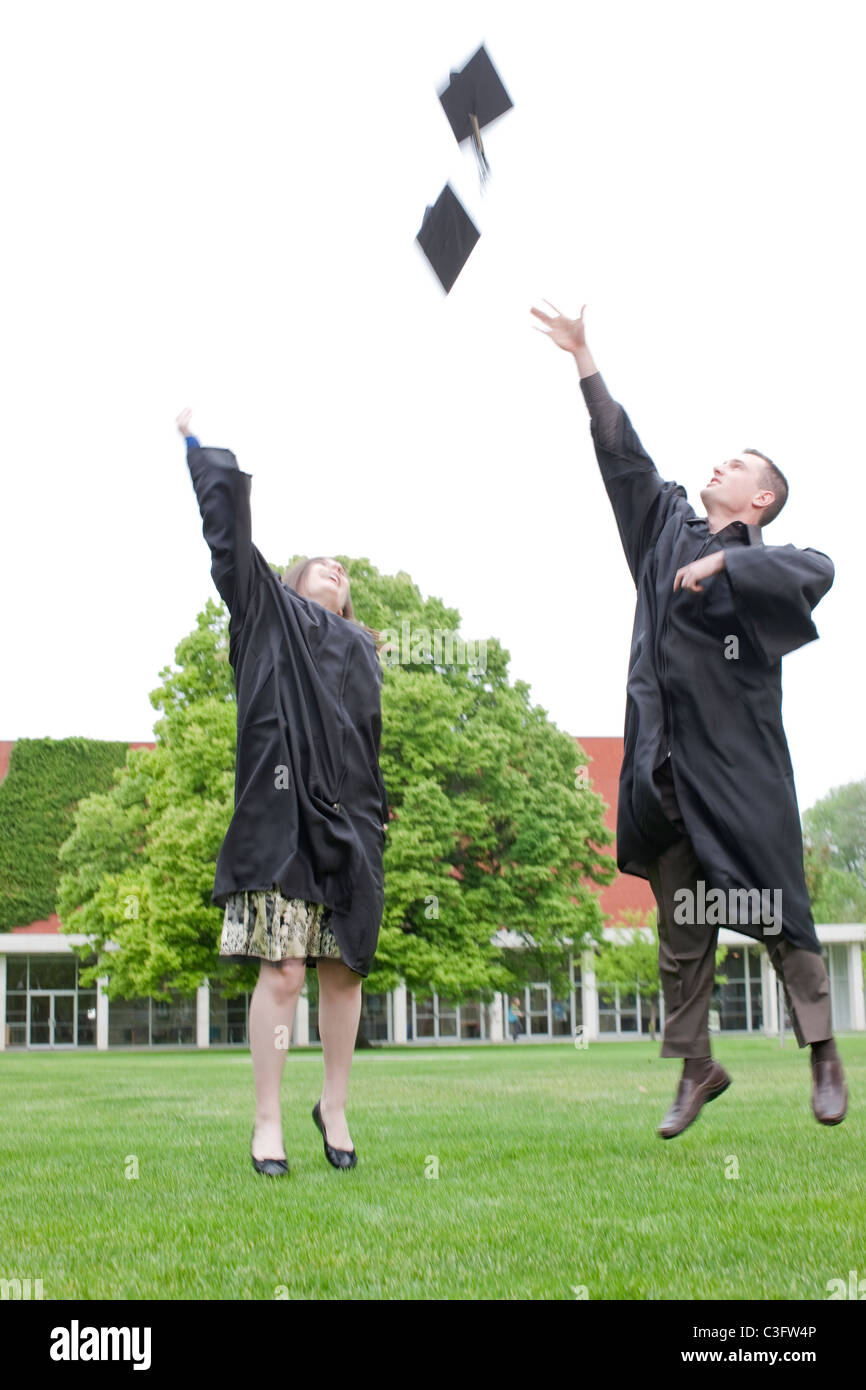 Graduates throwing caps hi-res stock photography and images - Alamy