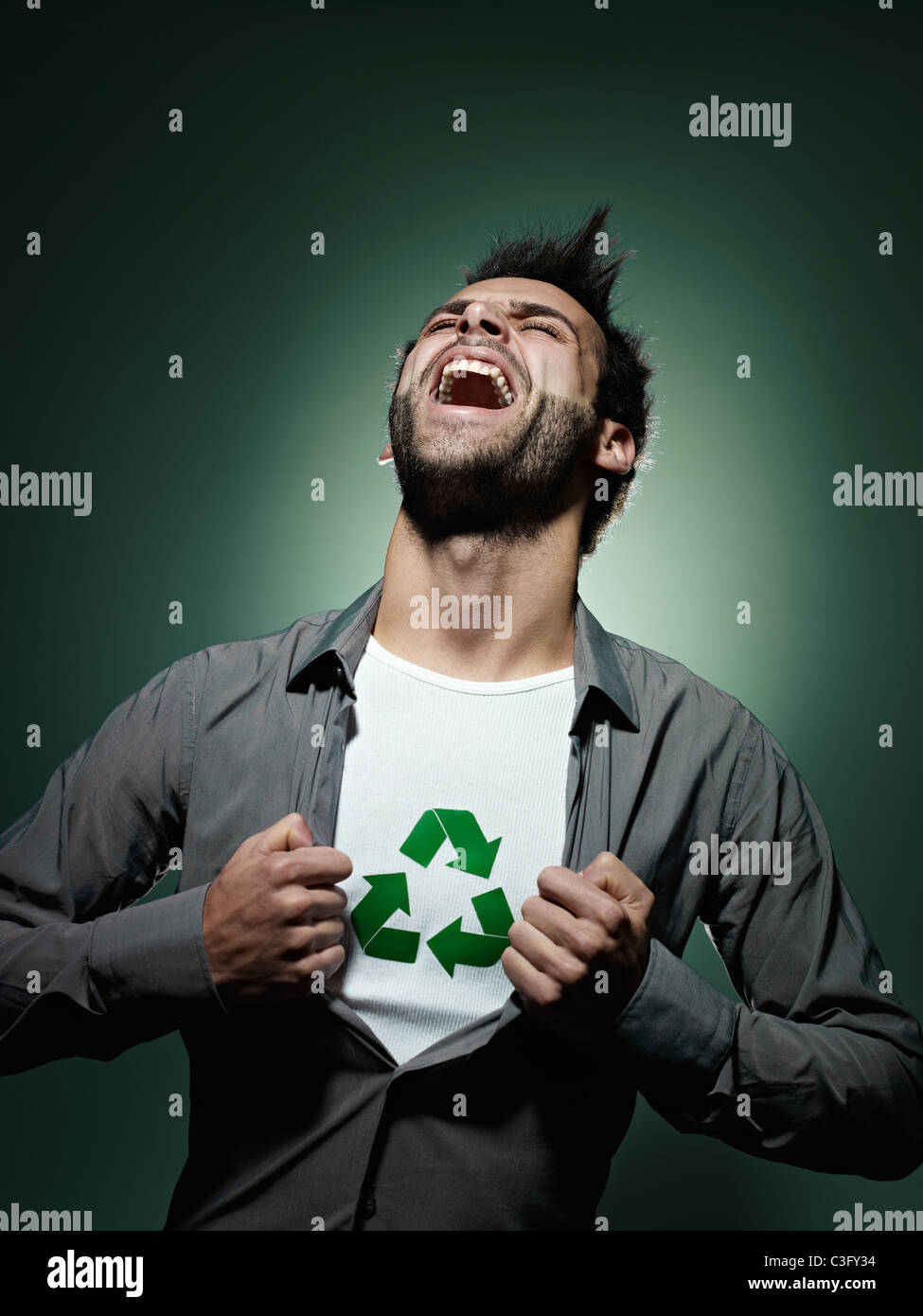 Caucasian man with recycling symbol in his shirt Stock Photo - Alamy