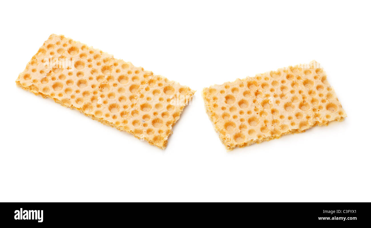 broken crunchy cracker isolated on white background Stock Photo - Alamy