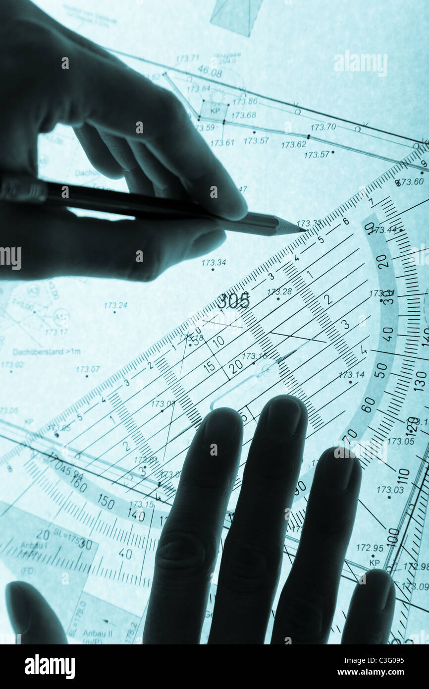 surveyor's plan and hands with a pencil, monochromatic blue Stock Photo ...