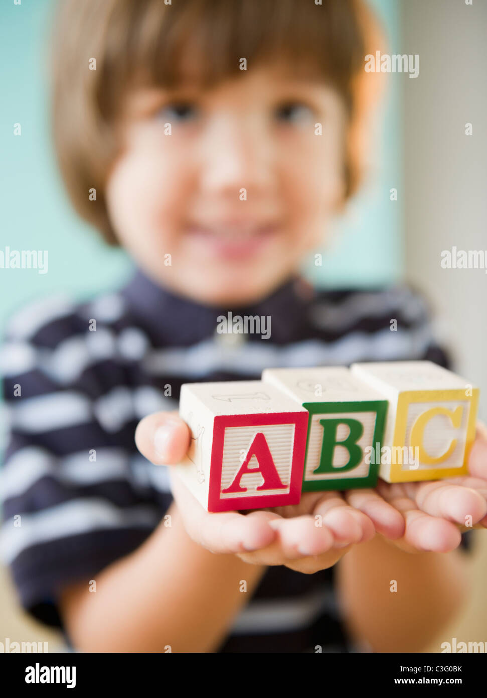 Hispanic boy playing with blocks hi-res stock photography and images ...
