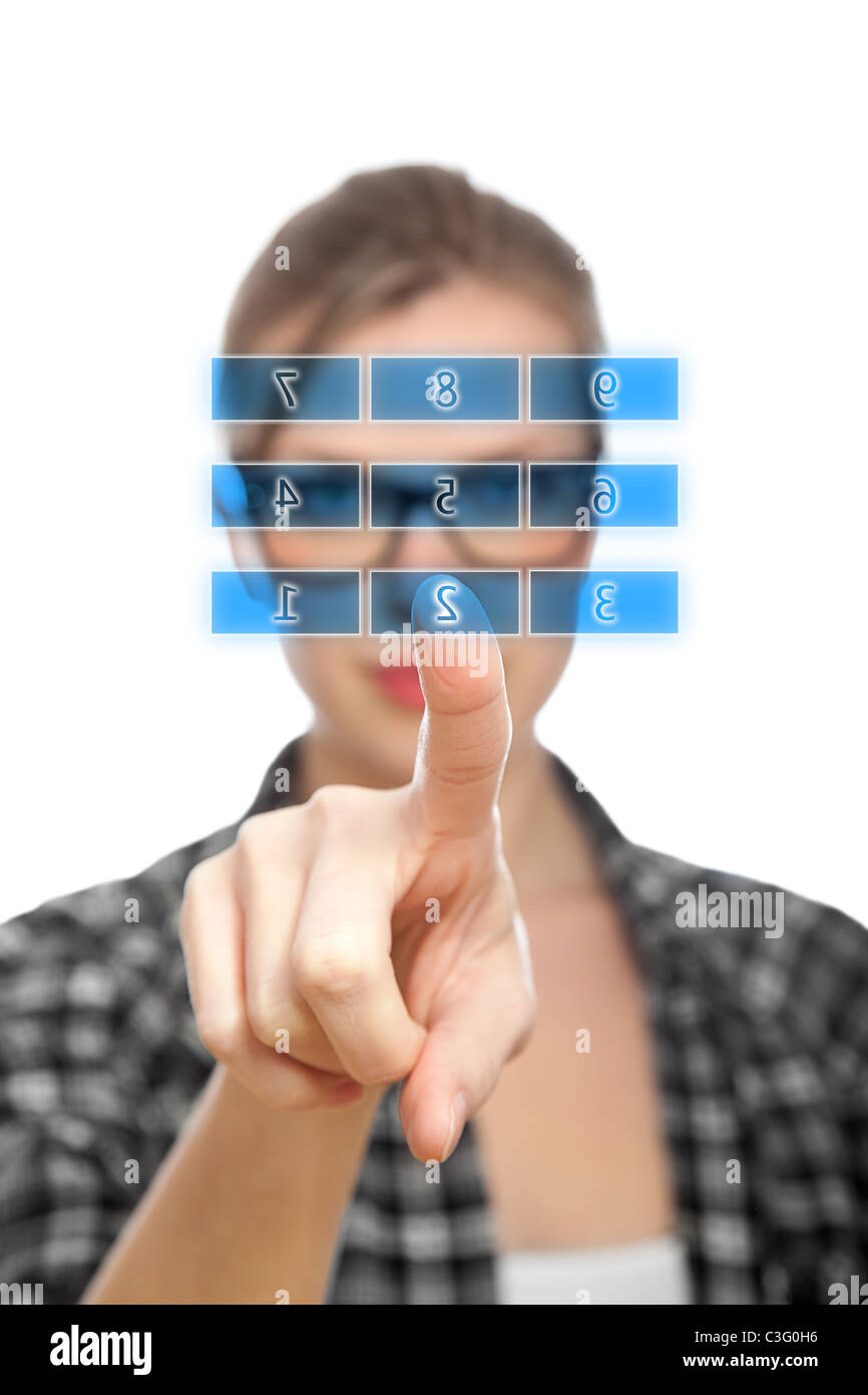 Blue touch screen numeric keypad and finger selecting number 2, blonde ... Blue touch screen numeric keypad and finger selecting number 2, blonde ...