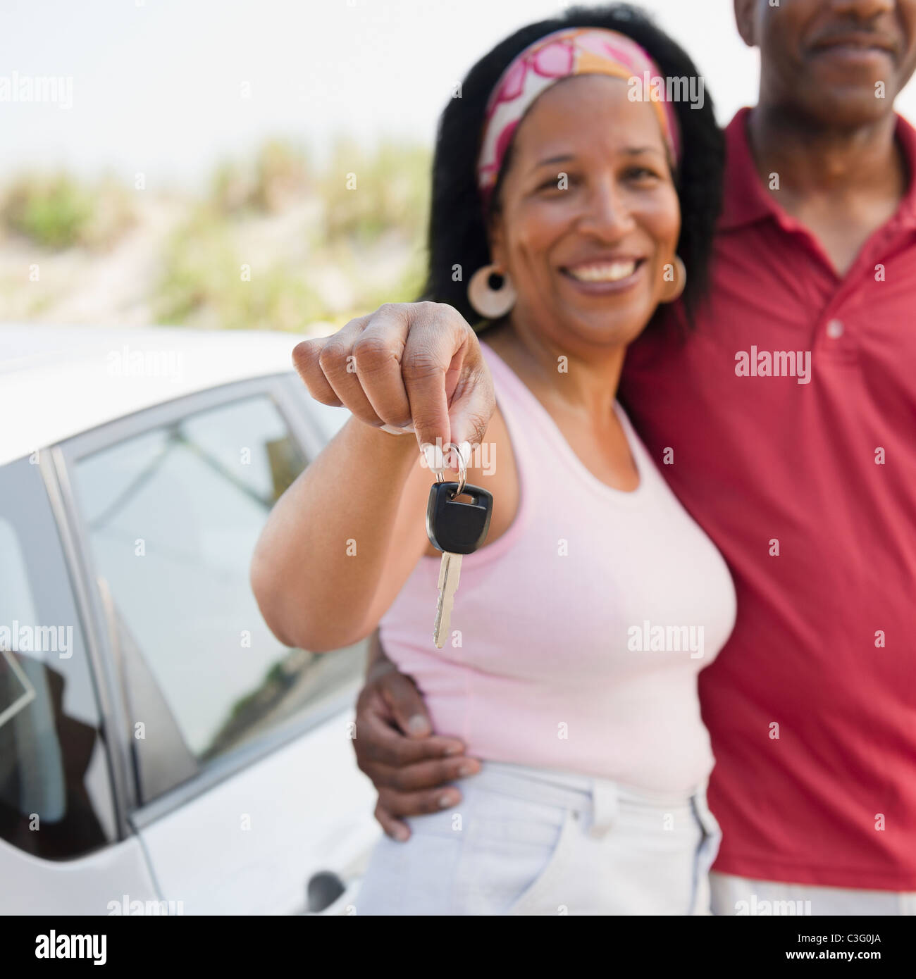 Black woman with husband holding car keys Stock Photo - Alamy Black woman with husband holding car keys Stock Photo - Alamy