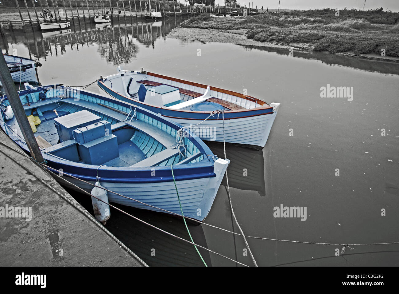 motor ports moored in tidal estuary Stock Photo - Alamy