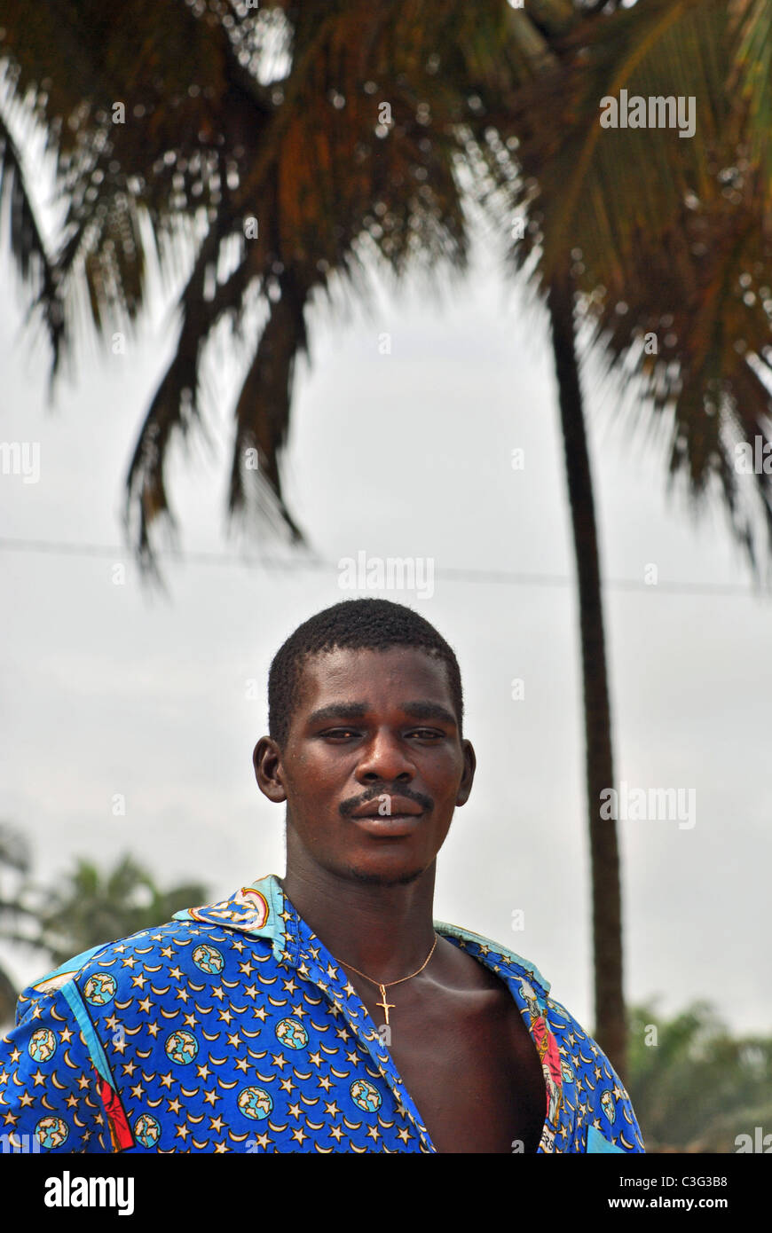 Portrait of young man in Jacqueville, Ivory Coast, West Africa Stock ...
