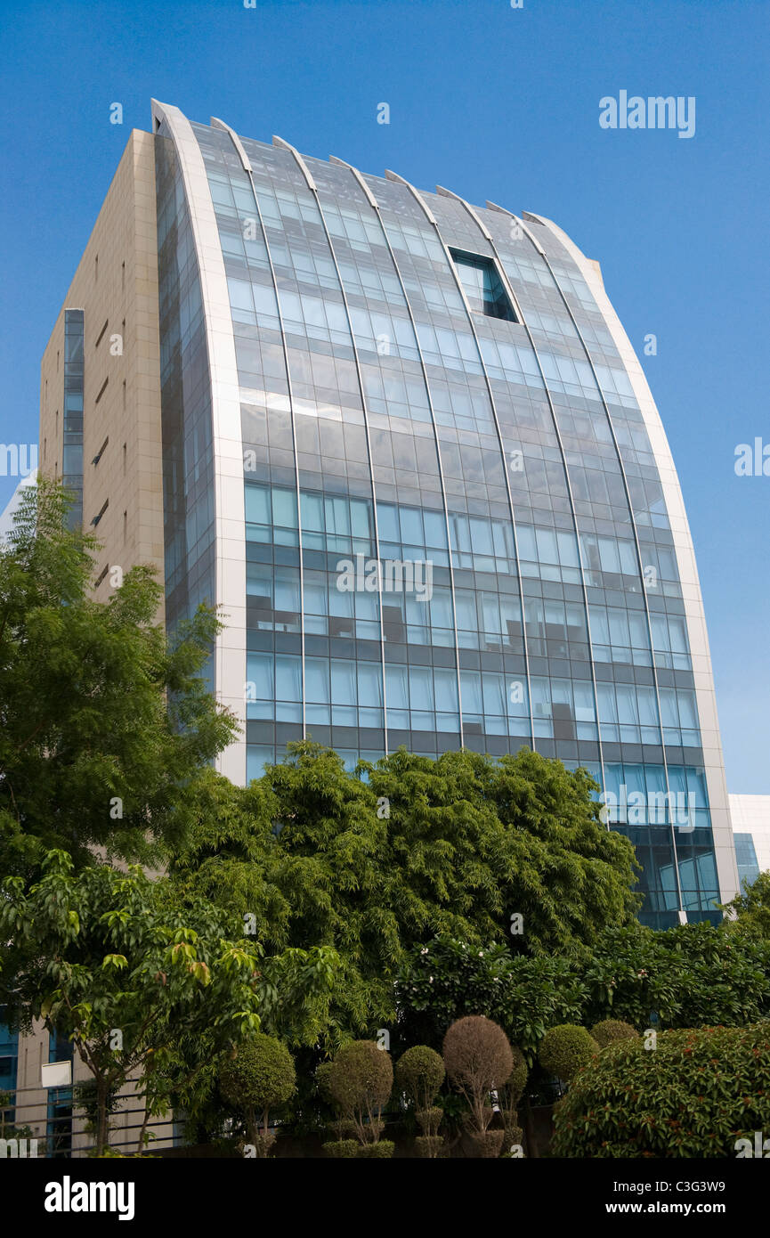 Trees in front of an office building, Gurgaon, Haryana, India Stock ...
