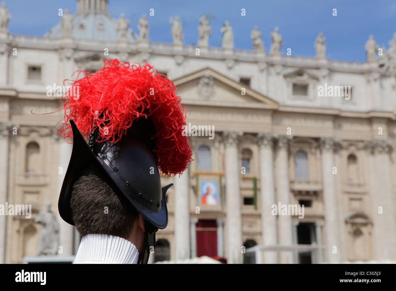 Swiss guards helmet plume and portrait of Pope John Paul II Stock Photo ...