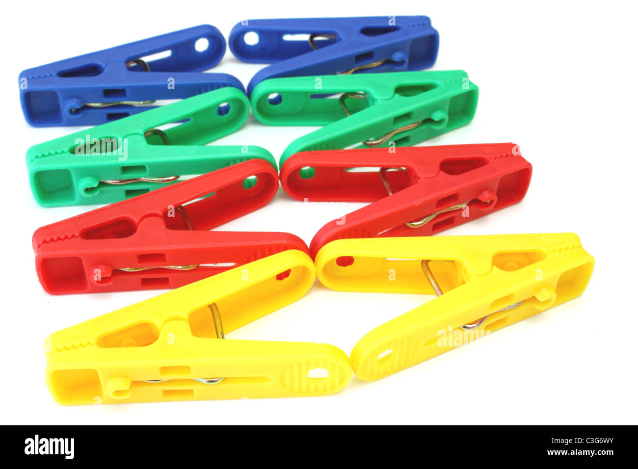 Group color clothespin isolated on a white background Stock Photo - Alamy