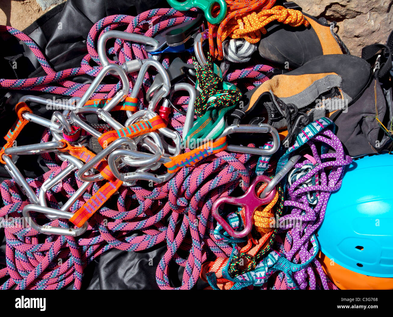 climbing sport equipment shackles harnesses ropes Stock Photo - Alamy