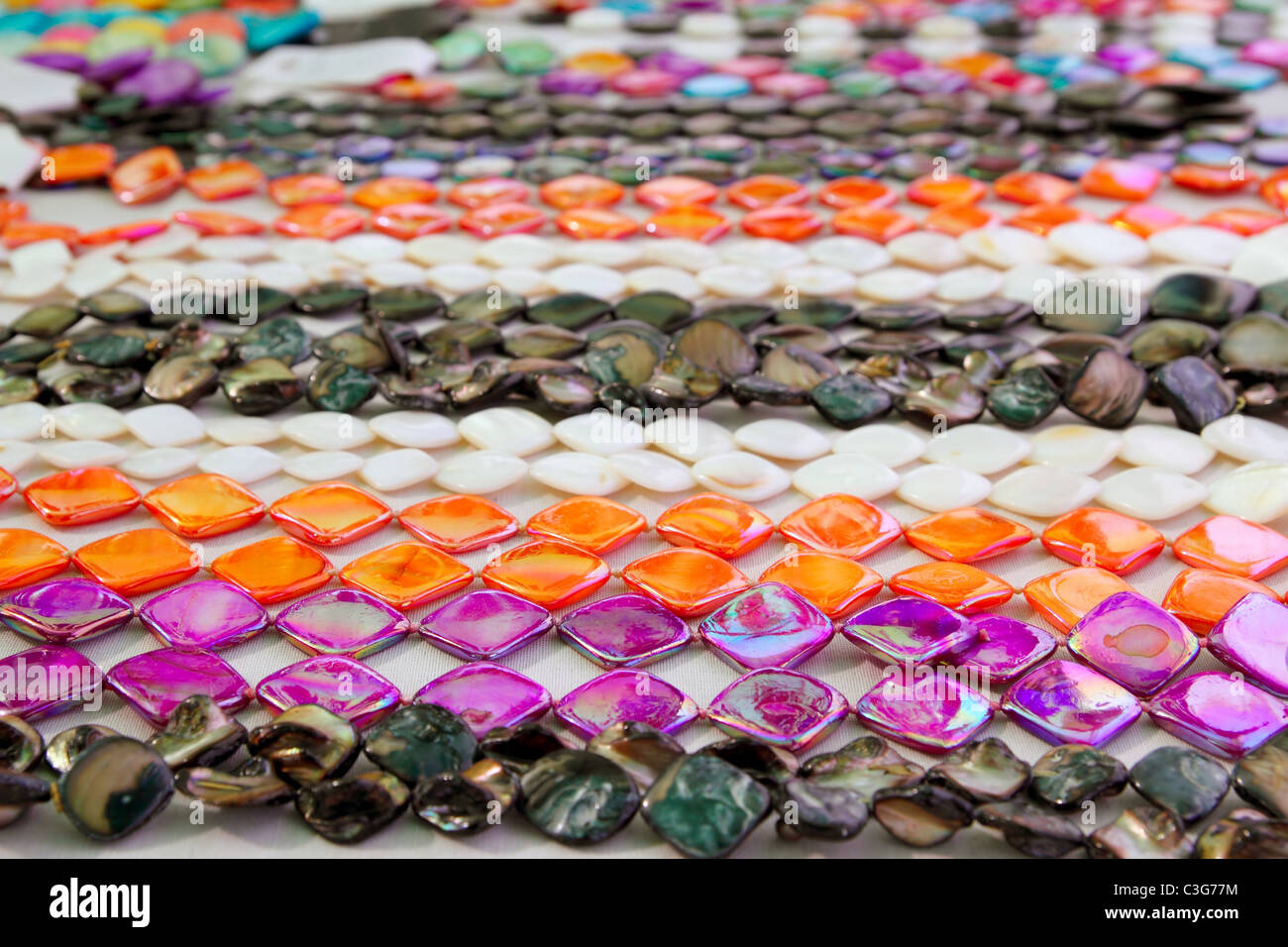 colorful jewellery necklace rows pink orange black white Stock Photo ...