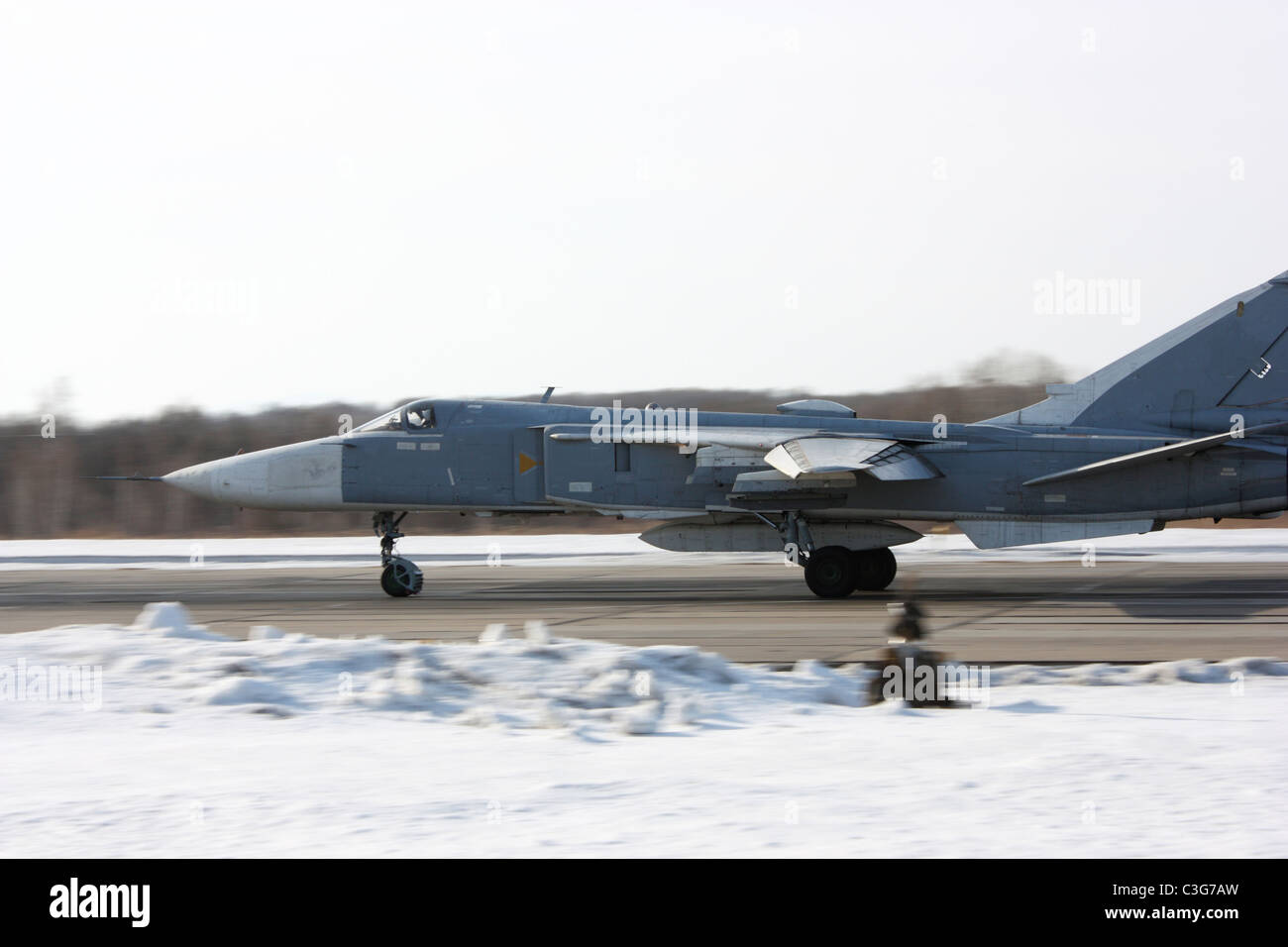 Military jet bomber Su-24 Fencer on take off and landing Stock Photo ...