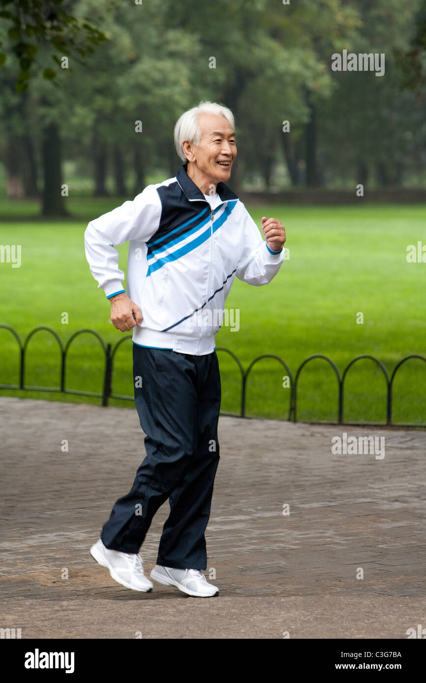 Senior chinese man jogging in hi-res stock photography and images - Alamy
