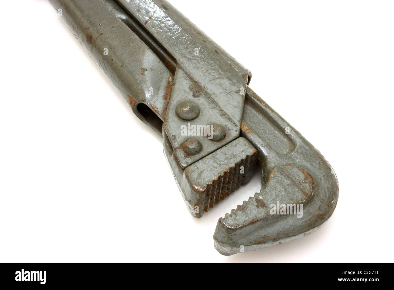 The big metal wrench for untwisting of pipes on a white background ...