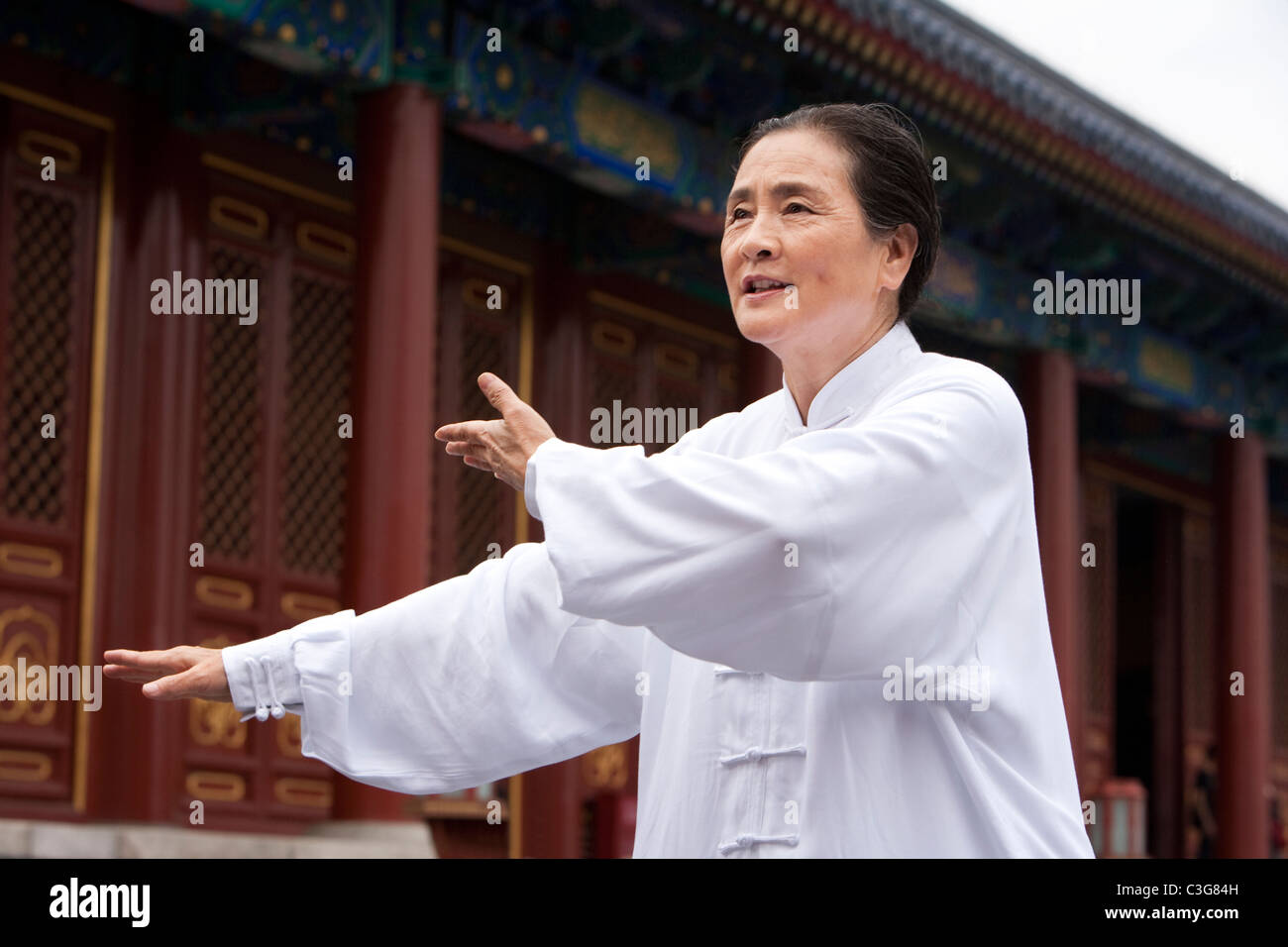 Senior Woman Practicing Tai Chi, Temple of Heaven Stock Photo - Alamy