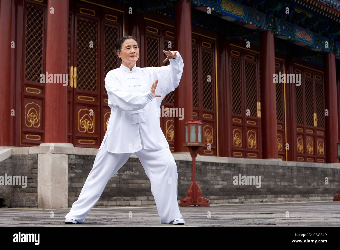 Senior asian woman practicing tai hi-res stock photography and images ...