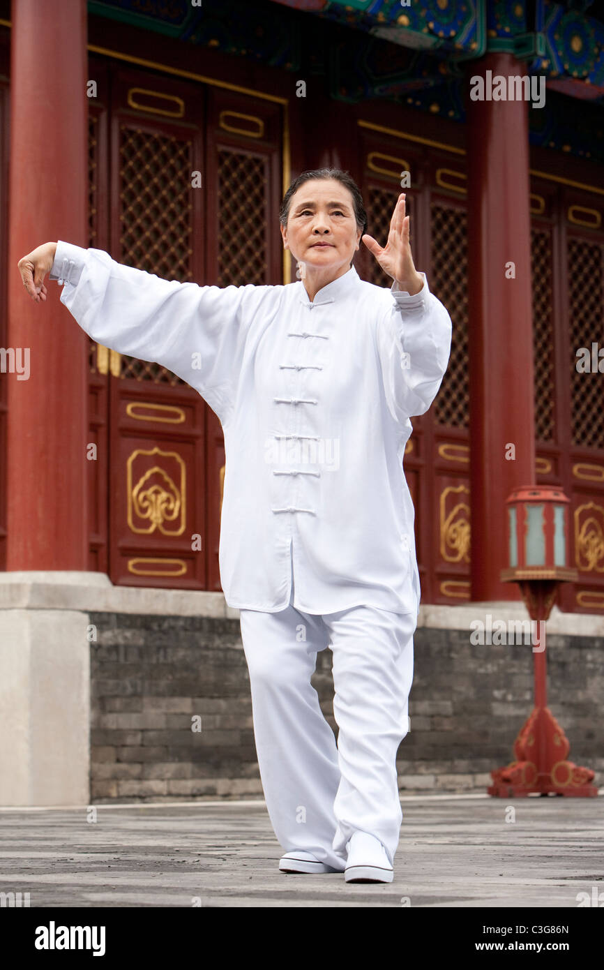 Senior Woman Practicing Tai Chi, Temple of Heaven Stock Photo - Alamy