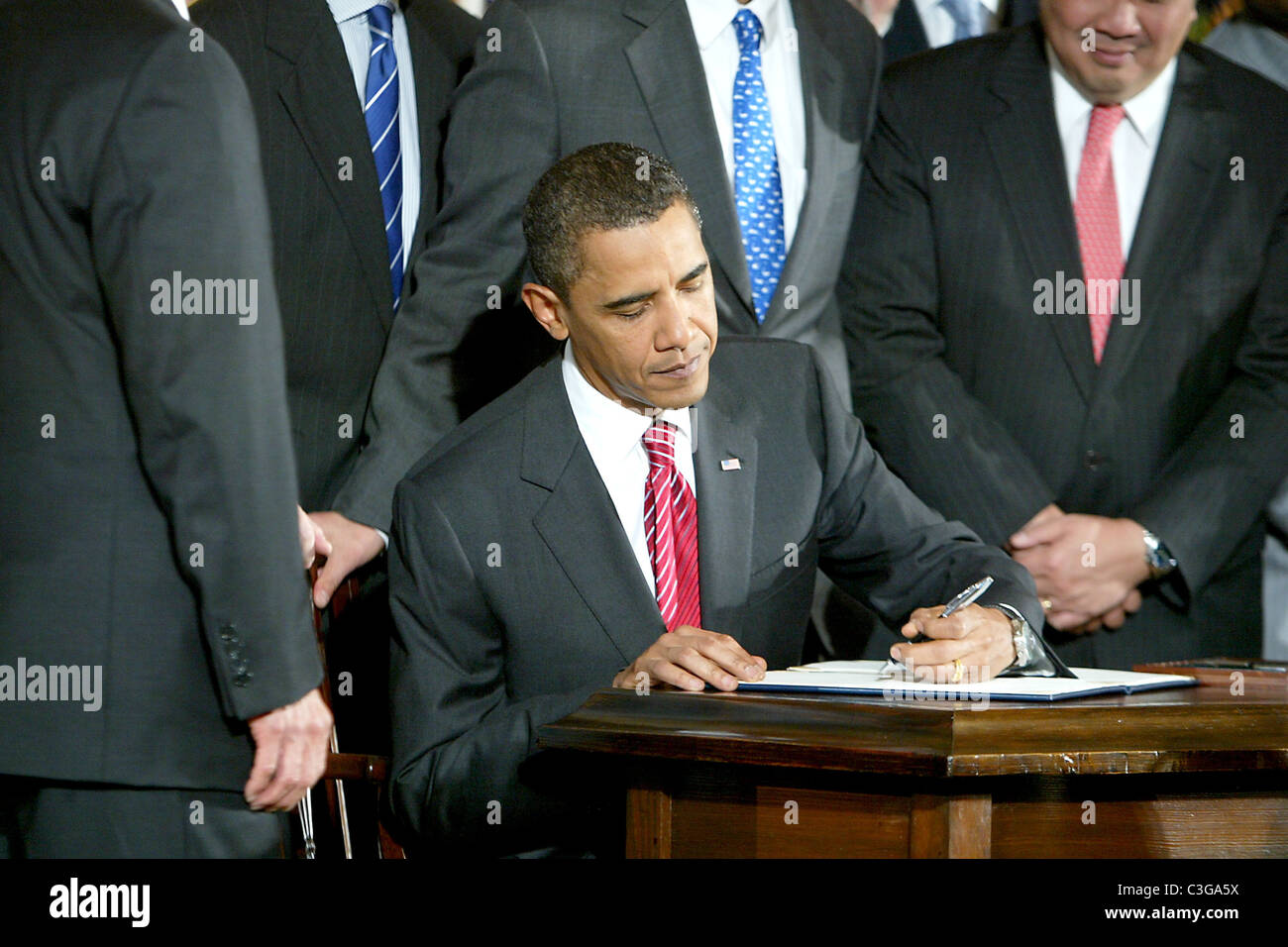 President Barack Obama President Barack Obama signs an executive order ...