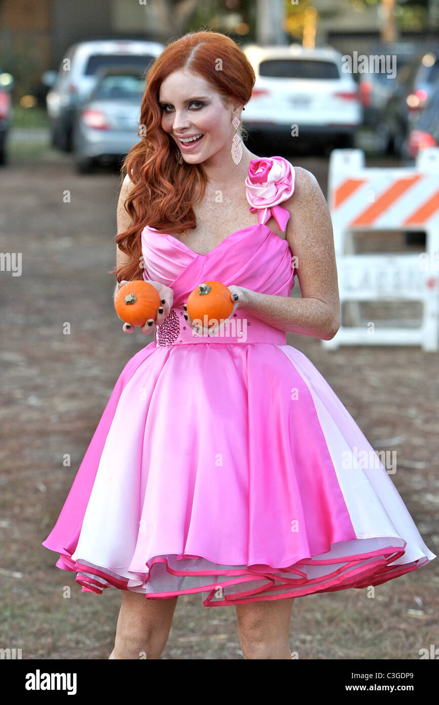 Phoebe Price wears a fancy pink dress during her visit to Mr. Bones ...