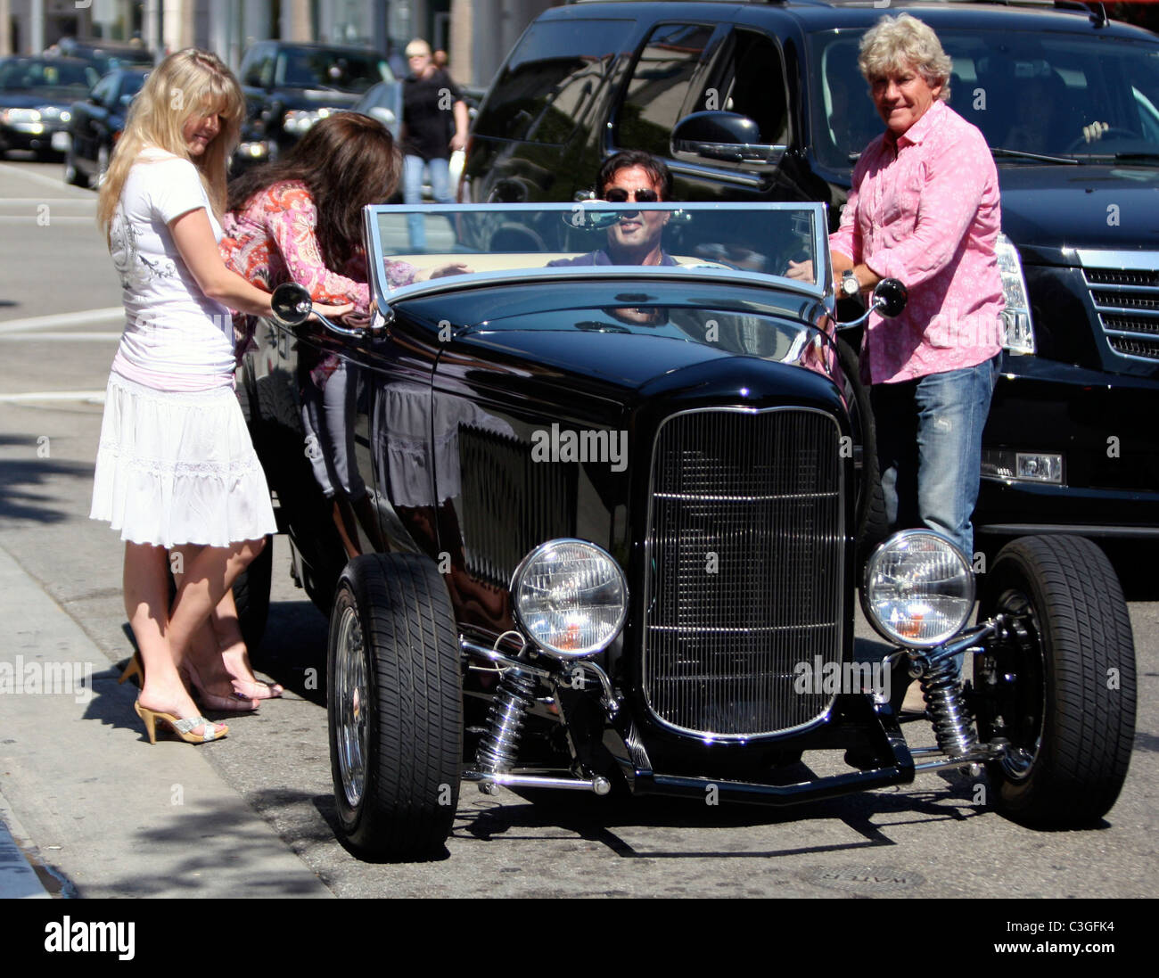 Sylvester Stallone drives his Hot Rod around Beverly Hills Los Angeles ...