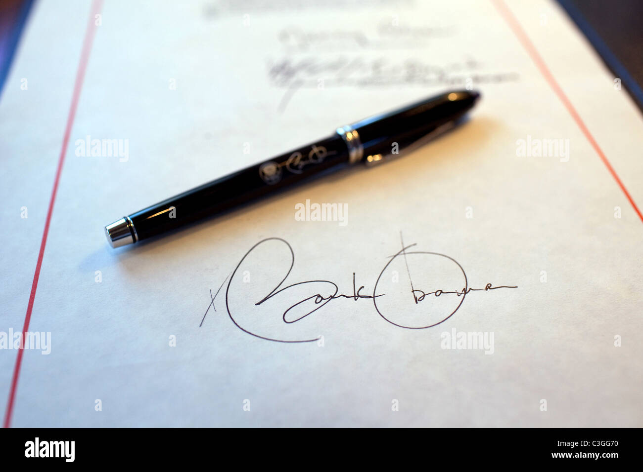 President Barack Obama's signature on a bill, and a pen used for the ...