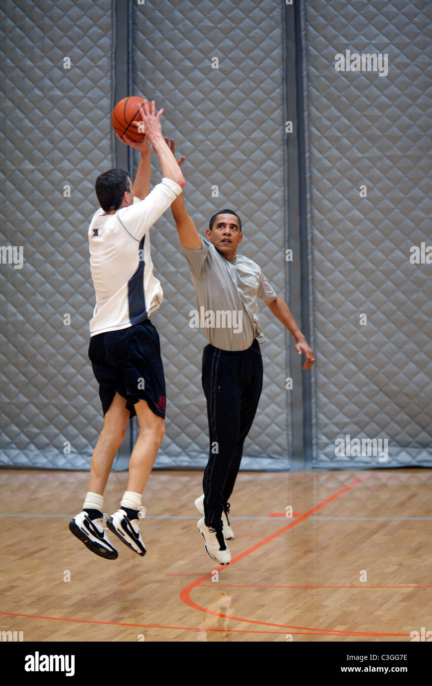 President Barack Obama and Arne Duncan play basketball together at the ...