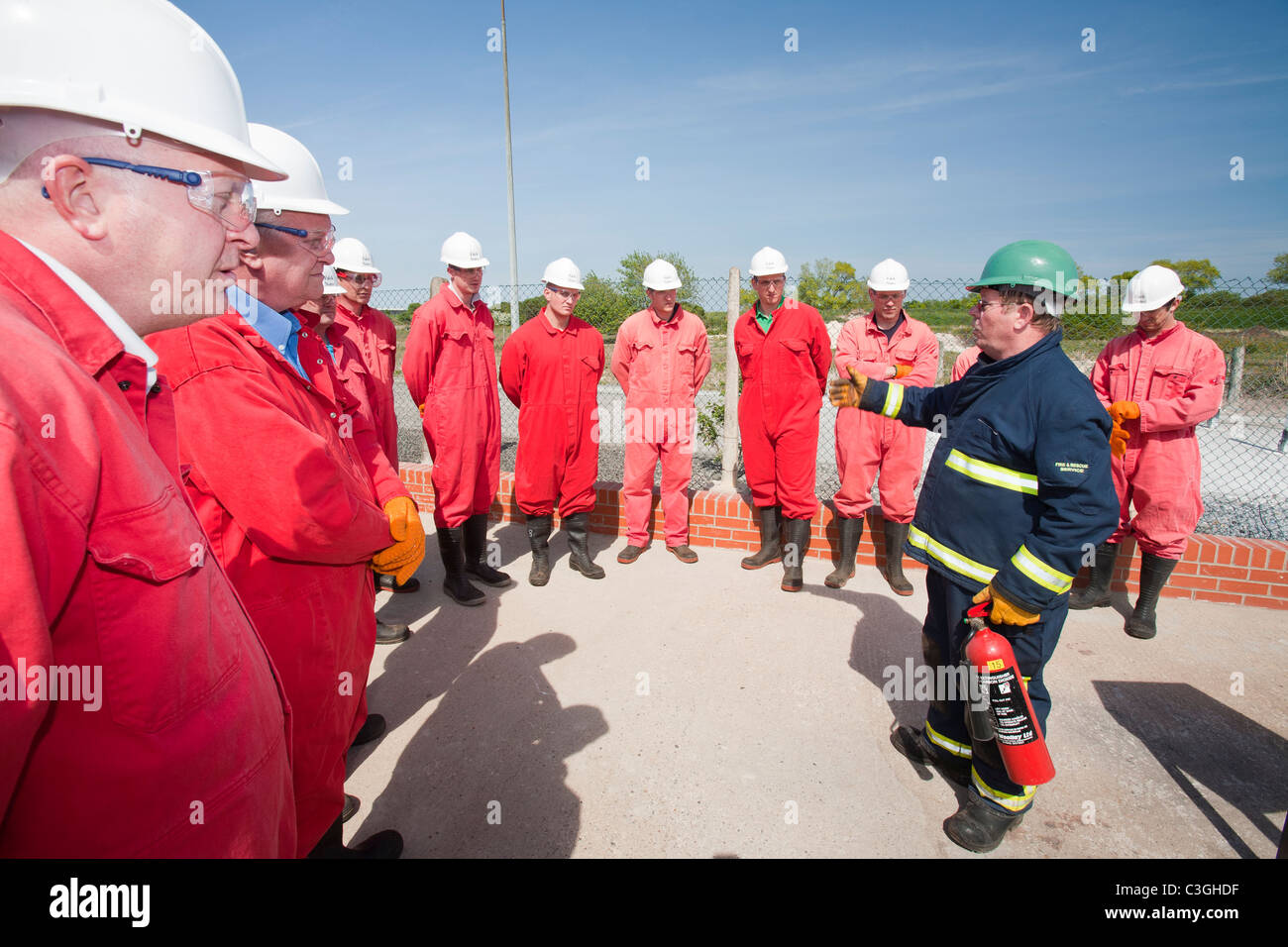 Workers in the offshore industry practice fire fighting as part of an ...